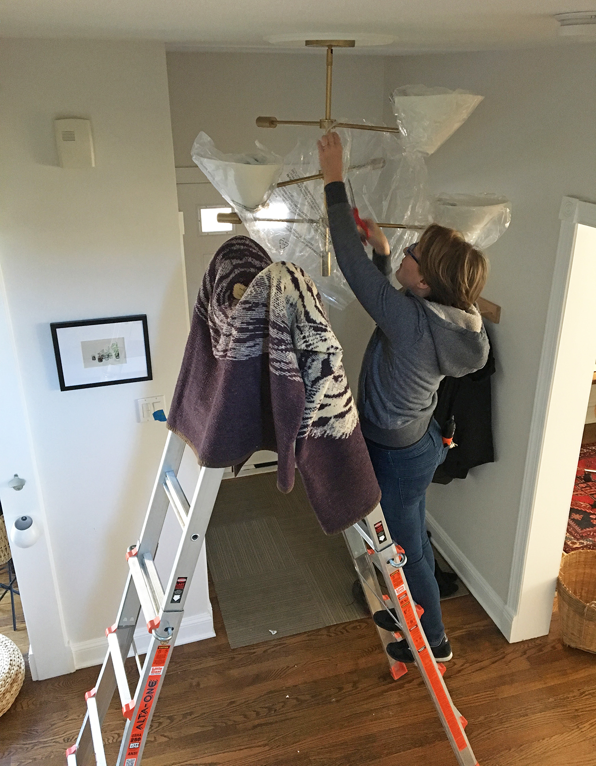 Entryway Progress: New Chandelier and Rug – Project Palermo