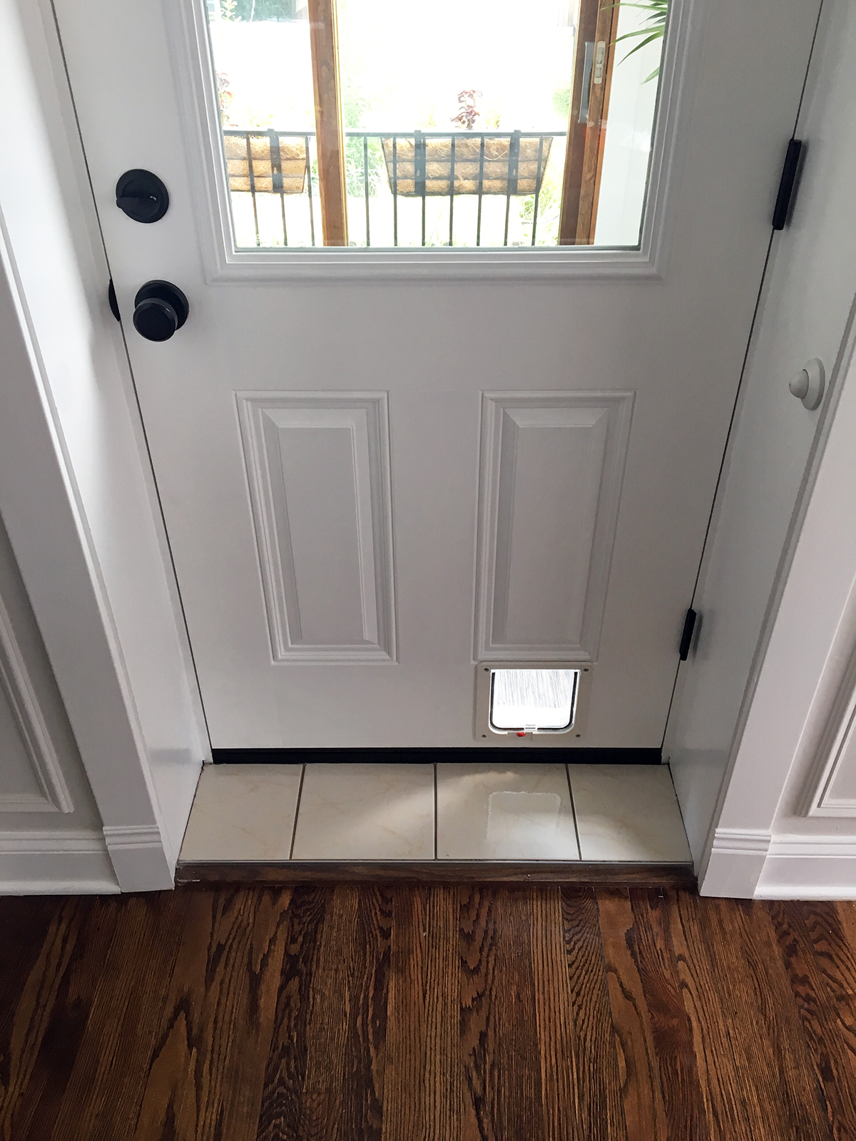 Kitchen Progress: New Door, Trim, and Threshold Tile – Project Palermo
